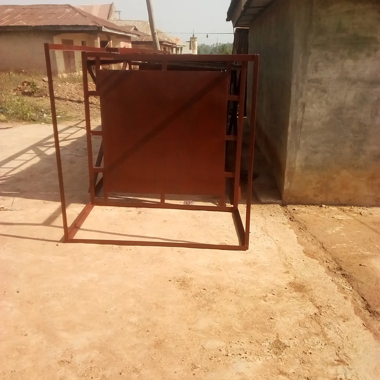 Erecting Iron Storex Stand In Our Compound