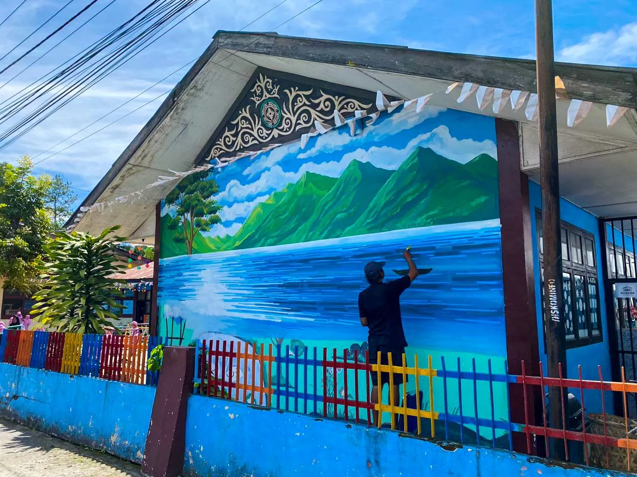 Painting of Lake and Mountain on School Wall